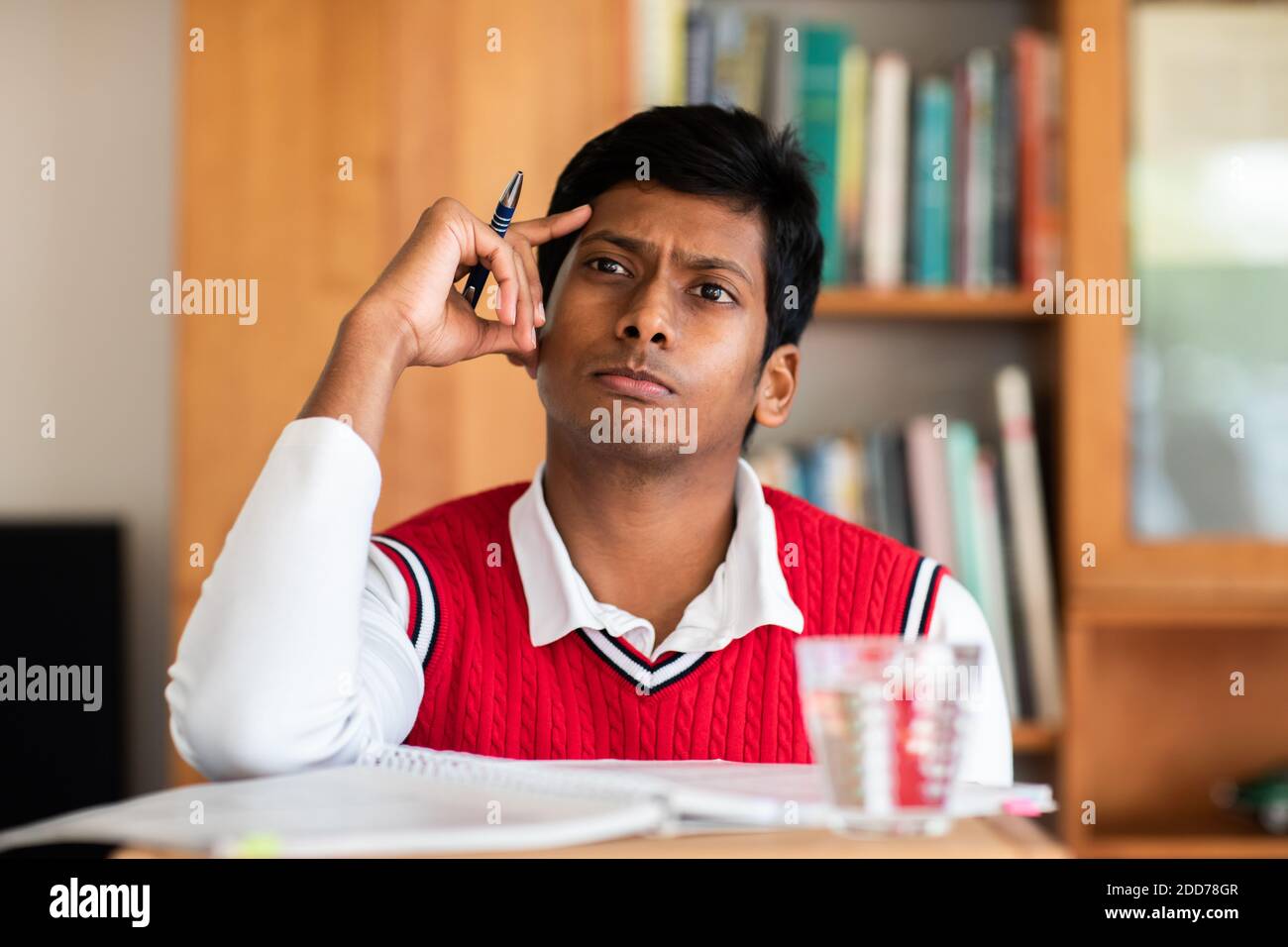 young man student learning in a room Stock Photo - Alamy