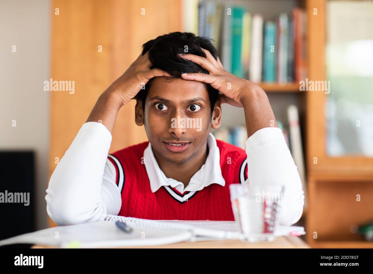 young man student learning in a room Stock Photo - Alamy