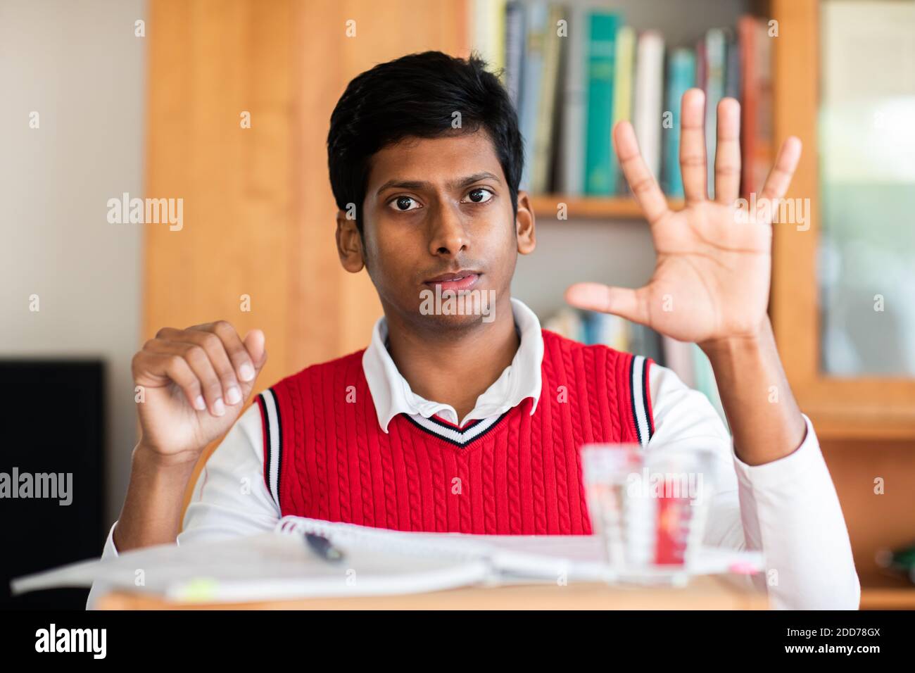 young man student learning in a room Stock Photo - Alamy