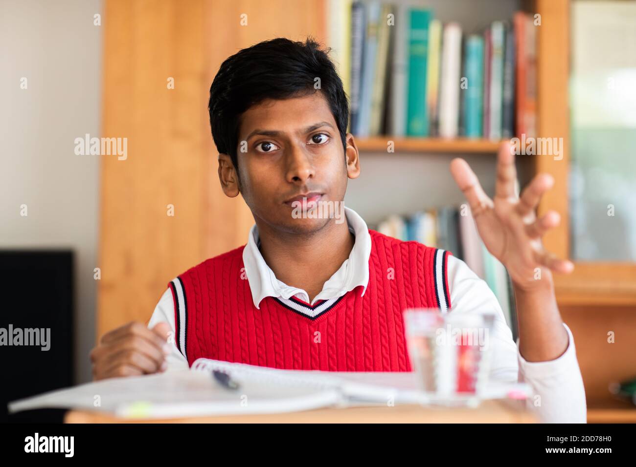 young man student learning in a room Stock Photo - Alamy