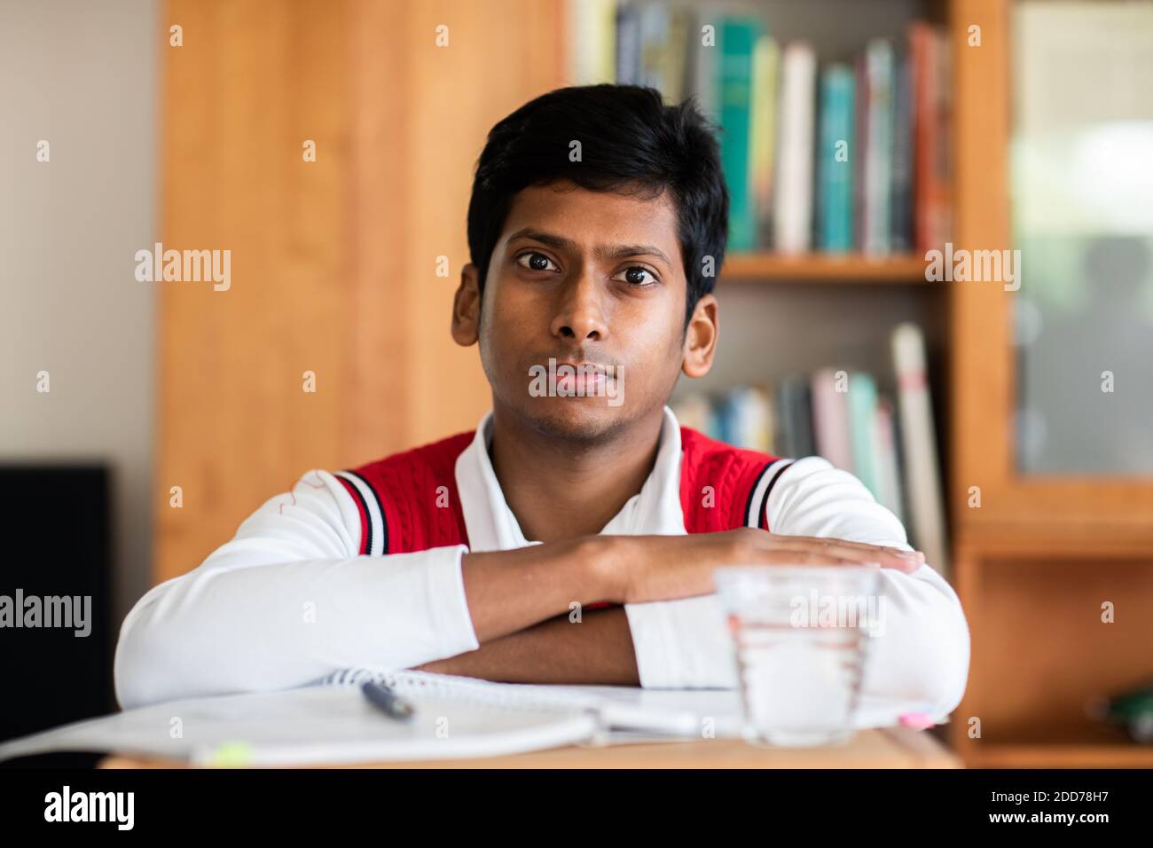 young man student learning in a room Stock Photo - Alamy