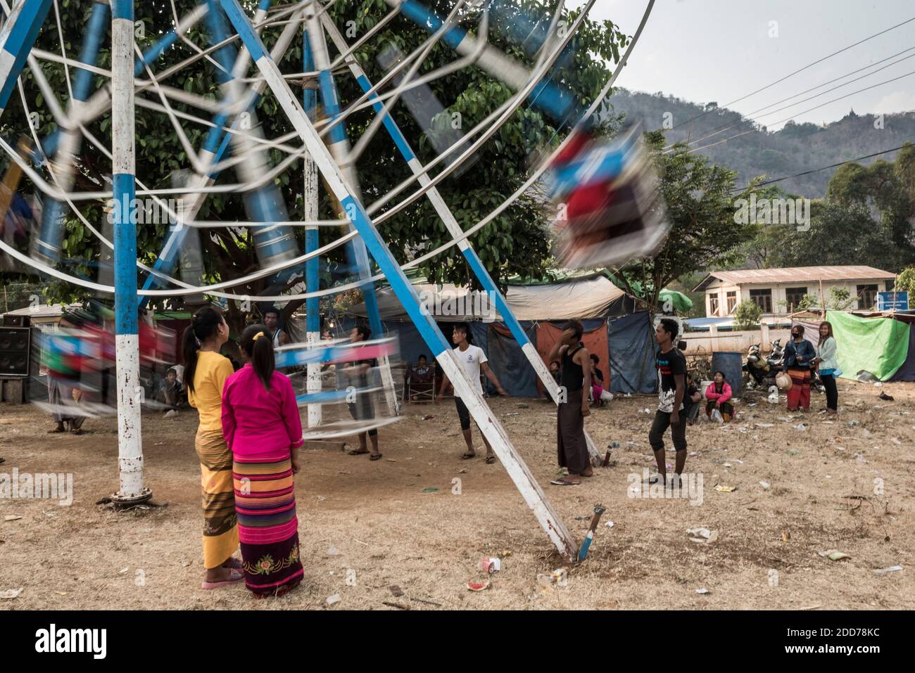 Hand operated ferris wheel at Pindaya Cave Festival, Shan State ...