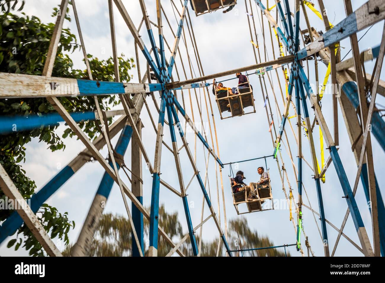 Hand operated ferris wheel at Pindaya Cave Festival, Shan State ...