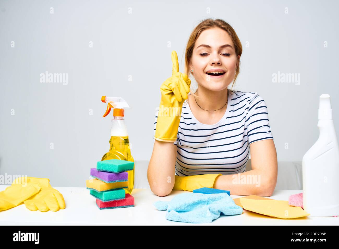 emotional woman detergent cleaning tool housework Lifestyle Stock Photo ...