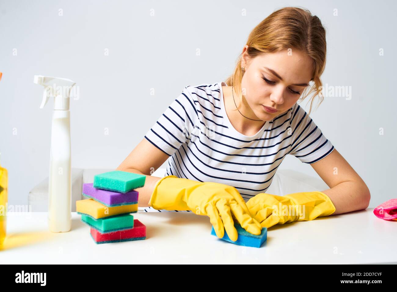 Cheerful cleaning lady wipes hi-res stock photography and images - Alamy