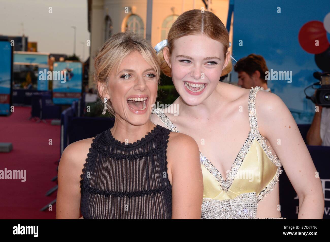 Melanie Laurent and Elle Fanning attending the premiere of Galveston ...