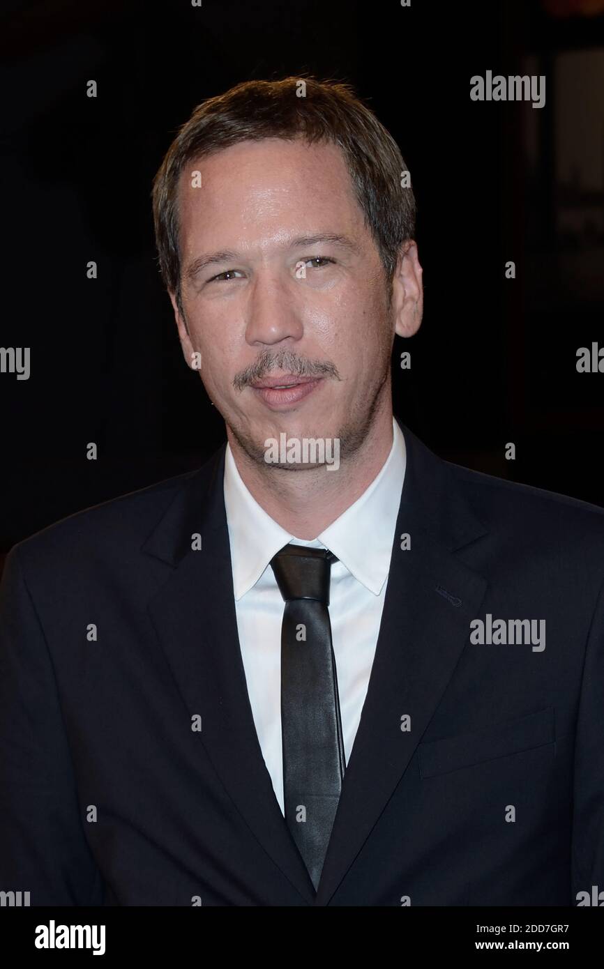 Reda Kateb attending the Freres Ennemis Premiere as part of the 75th ...