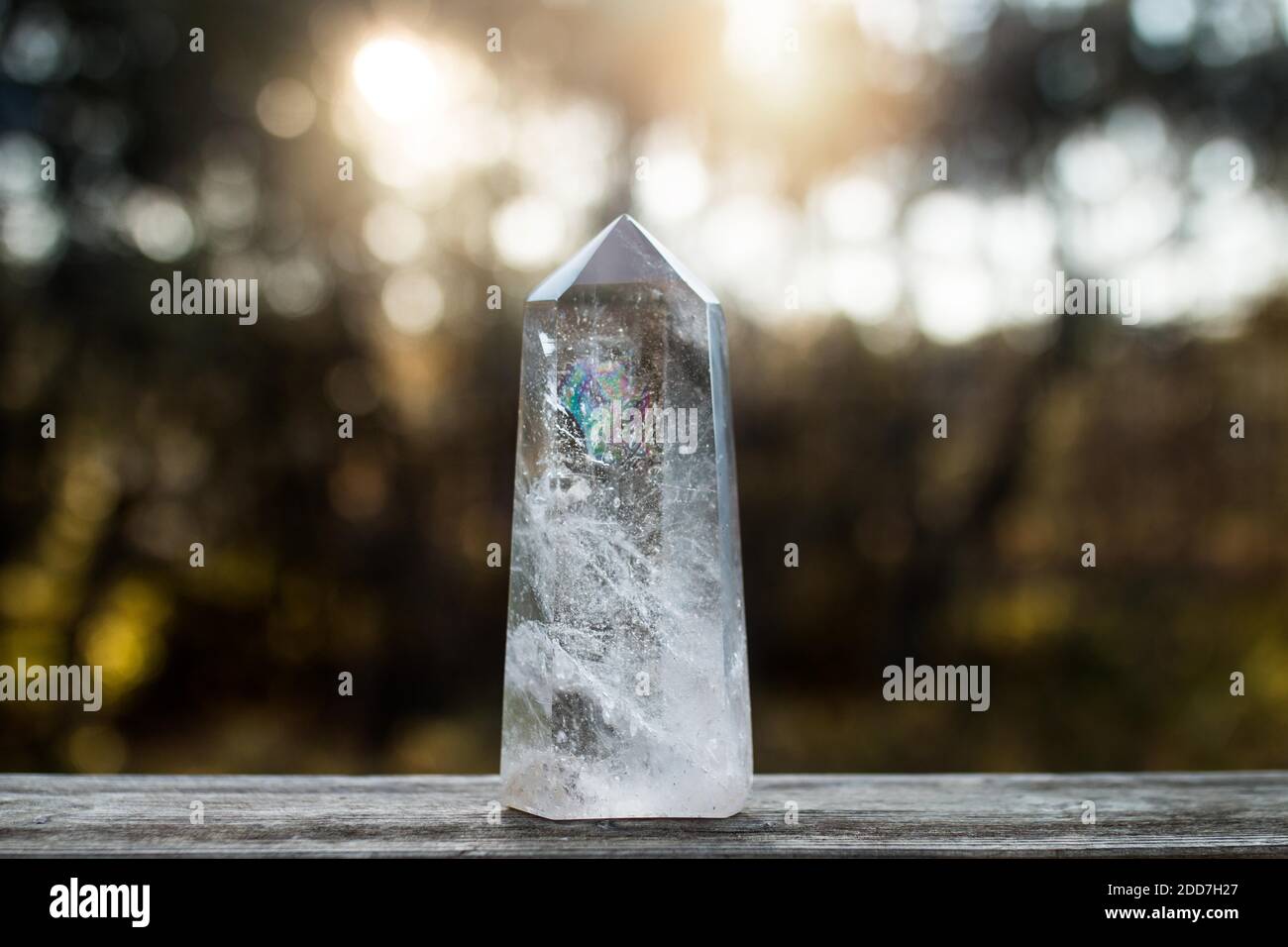 big crystal healing point clear quartz energy healing Stock Photo - Alamy