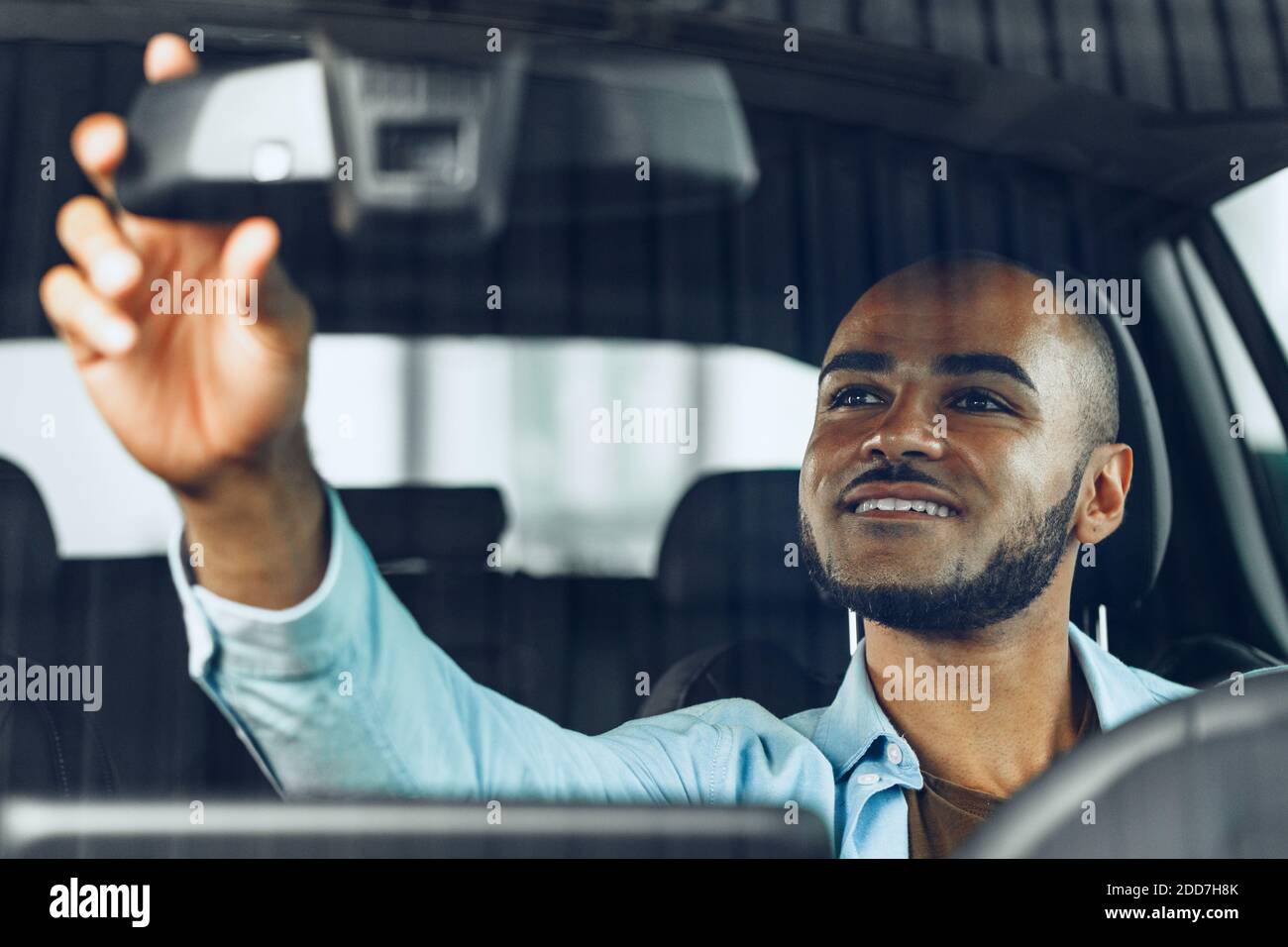 African american male driver sitting in a car Stock Photo - Alamy