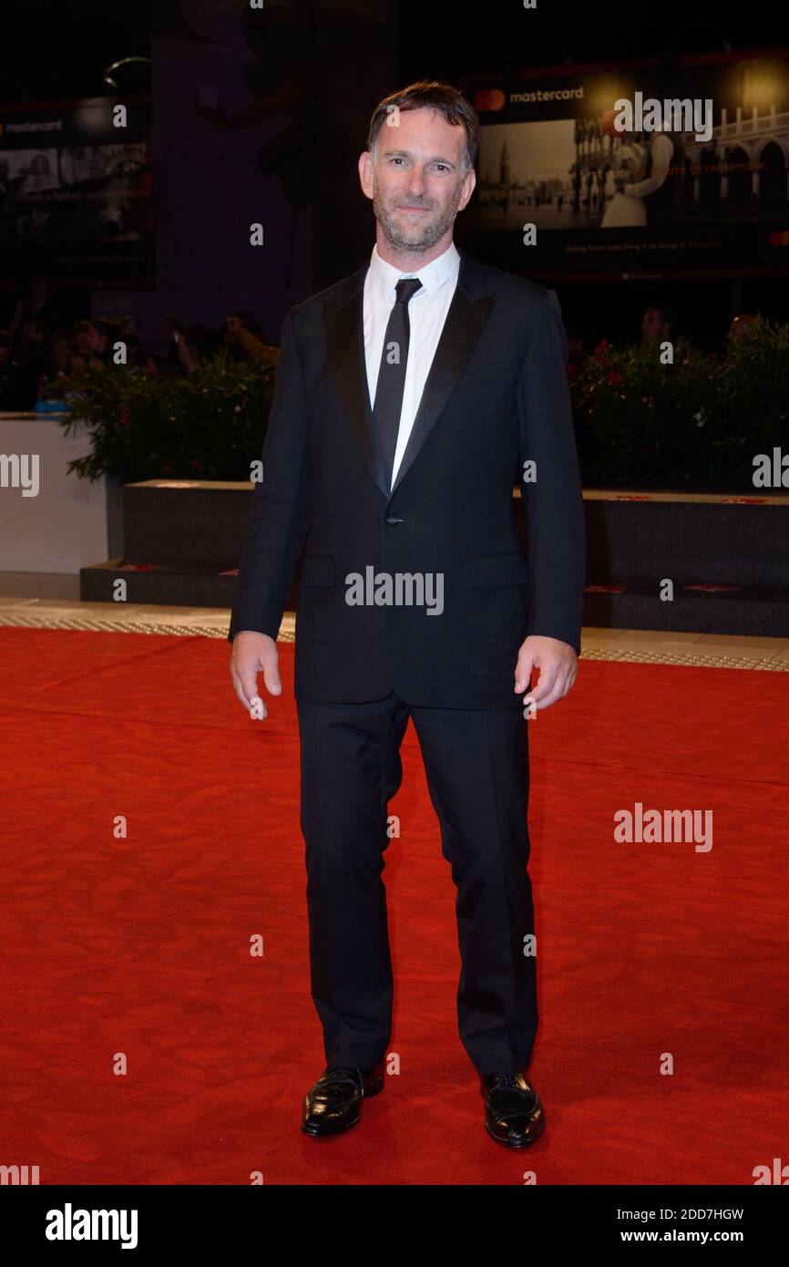 David Oelhoffen attending the Freres Ennemis Premiere as part of the ...