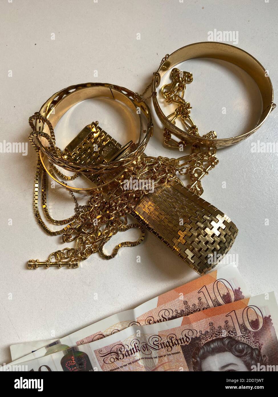 Pile of money and chains hi-res stock photography and images - Alamy