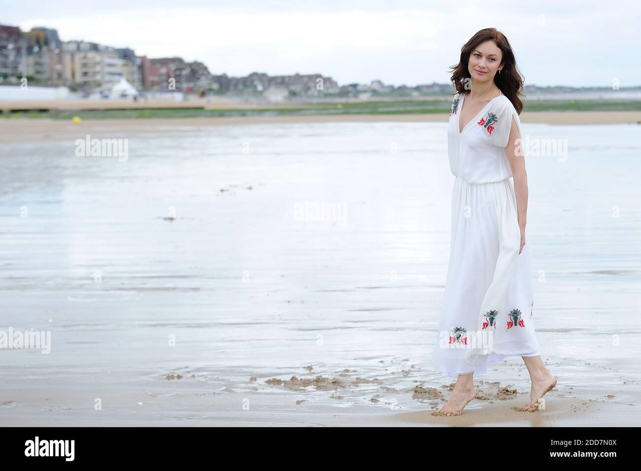 Olga Kurylenko attending a photo session on the beach as part of the ...