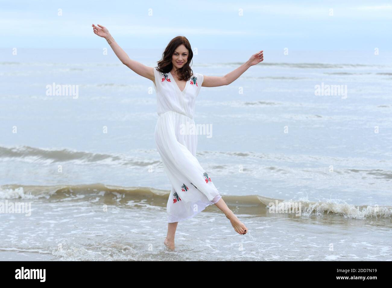 Olga Kurylenko attending a photo session on the beach as part of the ...