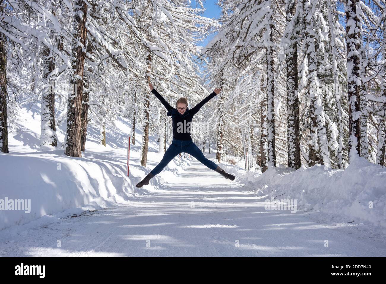 Women jumping snow hi-res stock photography and images - Alamy