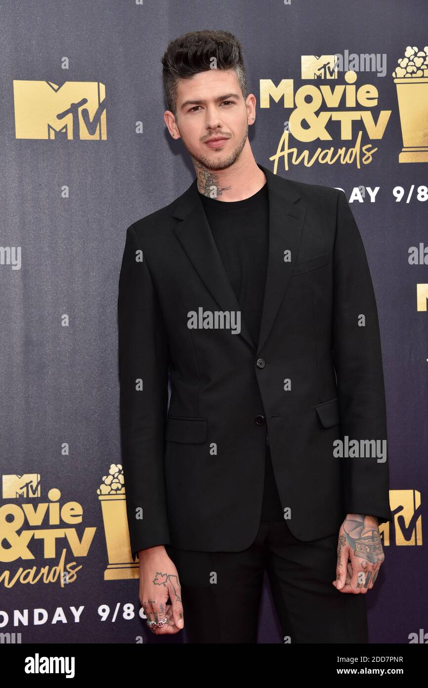 Travis Mills attends the 2018 MTV Movie And TV Awards at Barker Hangar ...