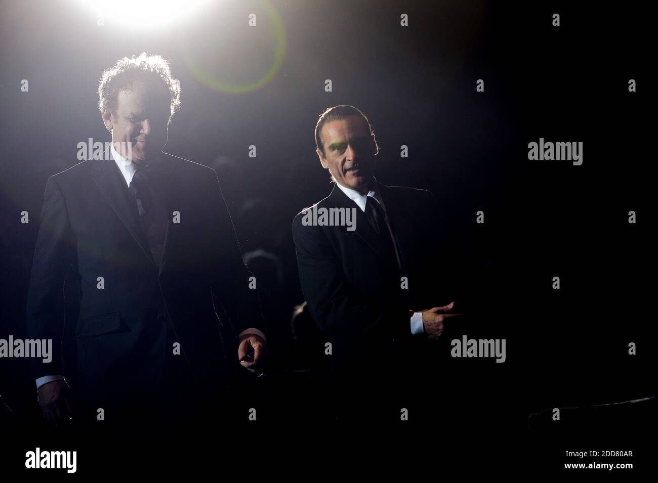 John C. Reilly, Joaquin Phoenix attending the premiere of The Sisters ...