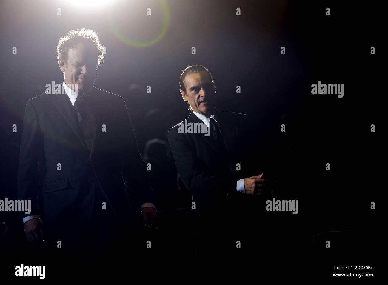 John C. Reilly, Joaquin Phoenix attending the premiere of The Sisters ...