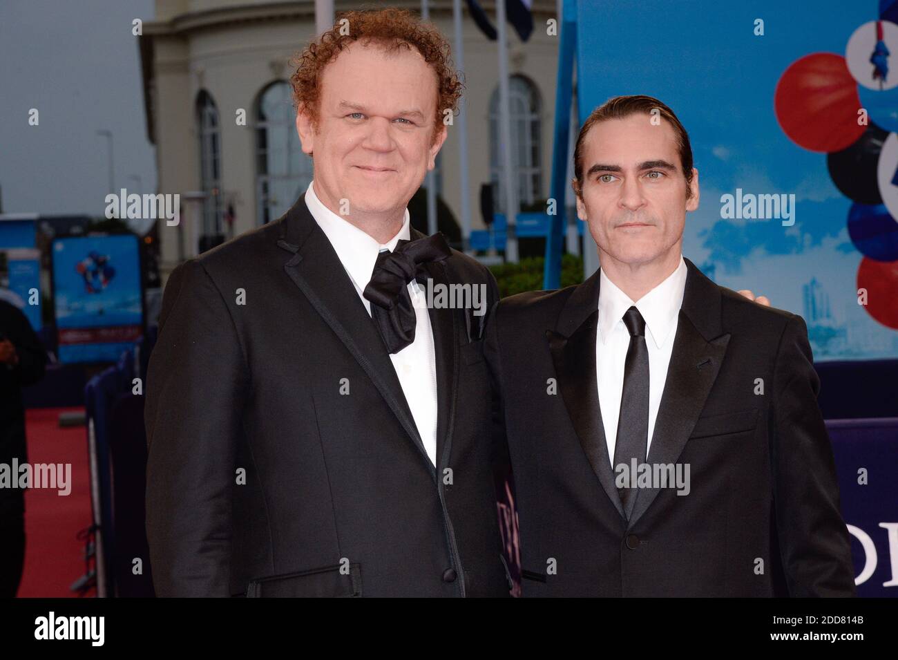 John C. Reilly, Joaquin Phoenix attending the premiere of The Sisters ...