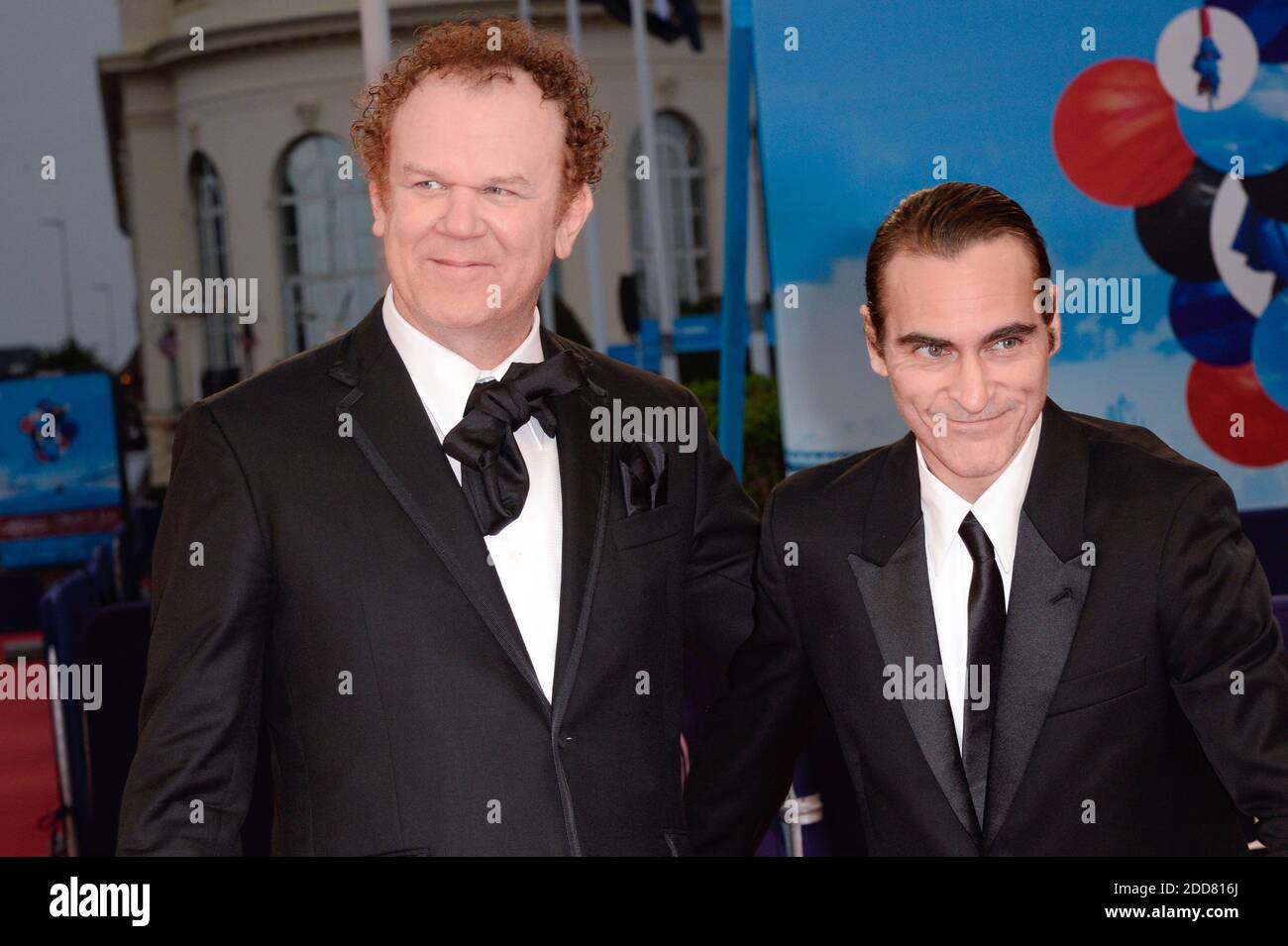 John C. Reilly, Joaquin Phoenix attending the premiere of The Sisters ...