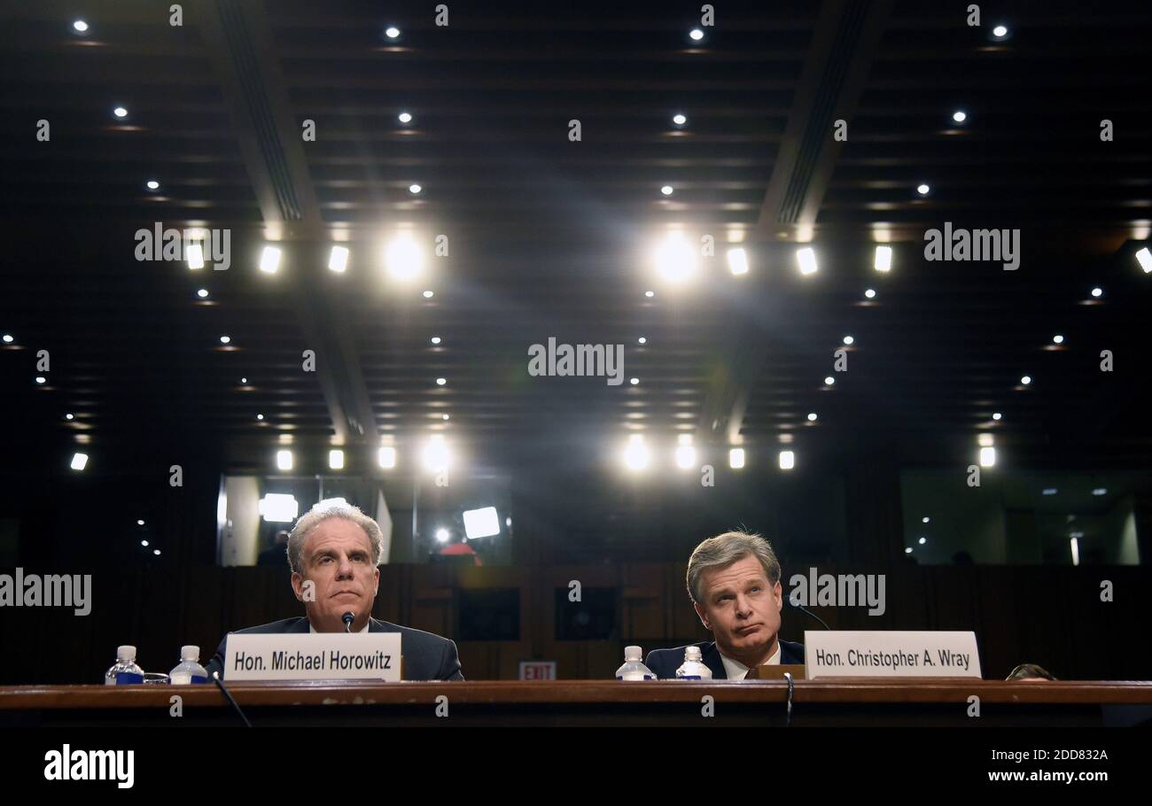 Justice Department Inspector General Michael Horowitz (L) and Federal ...