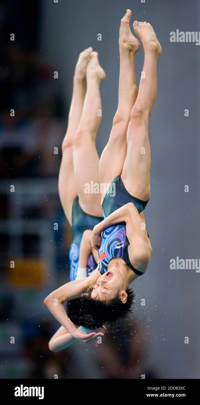 NO FILM, NO VIDEO, NO TV, NO DOCUMENTARY - Ruolin Chen, front, and Xin ...