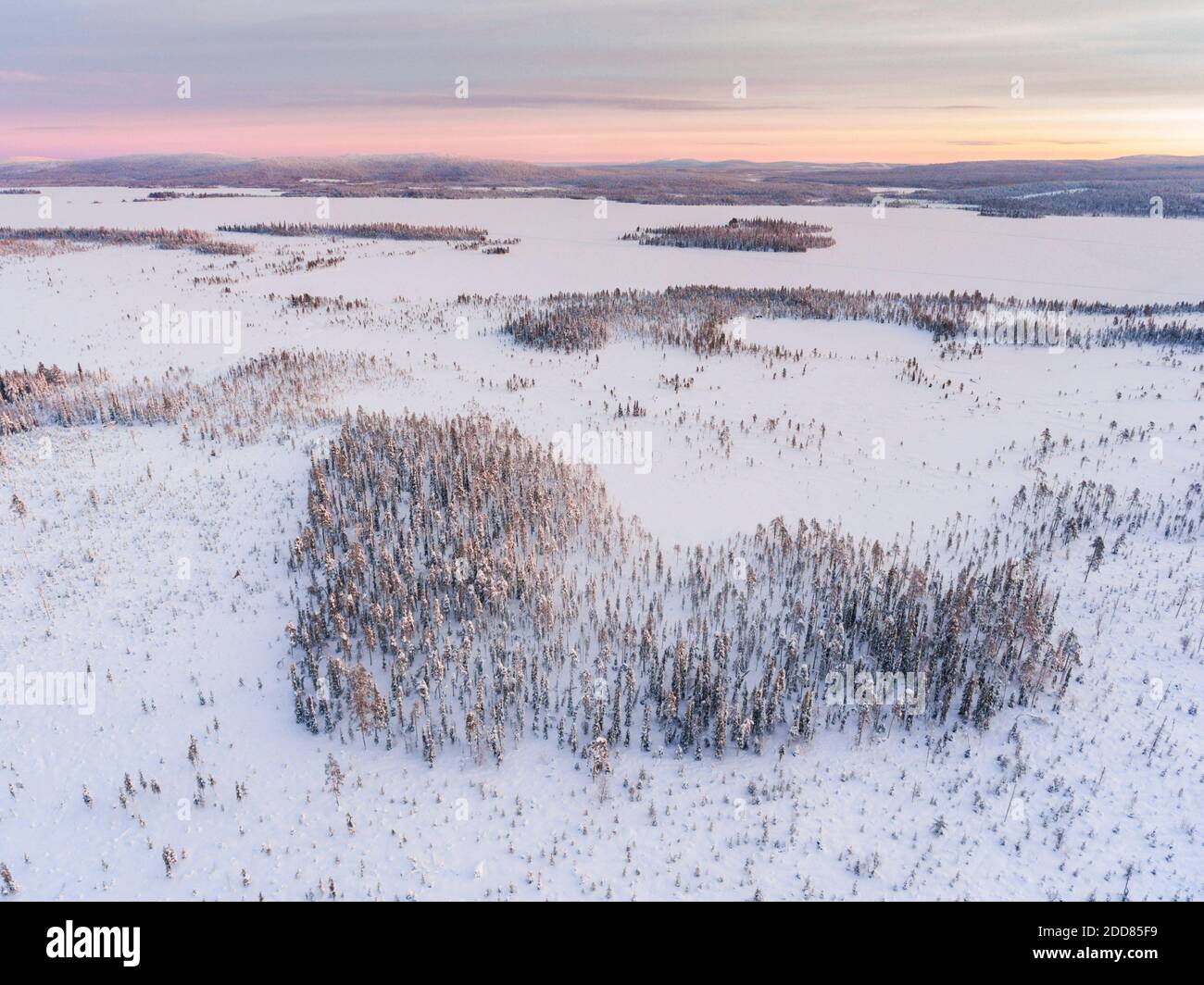 Romantic heart shaped forest in a snow covered winter landscape in the ...