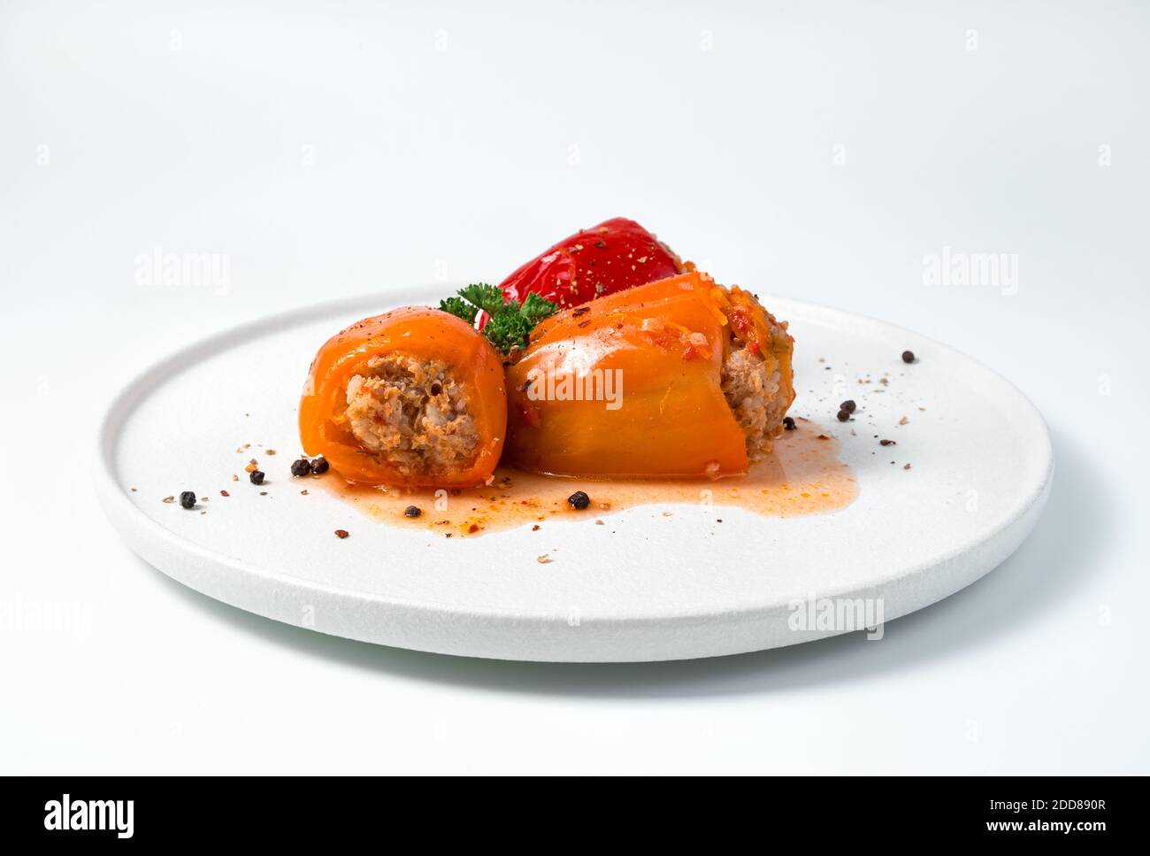 White flat dish with stuffed bell pepper Stock Photo - Alamy