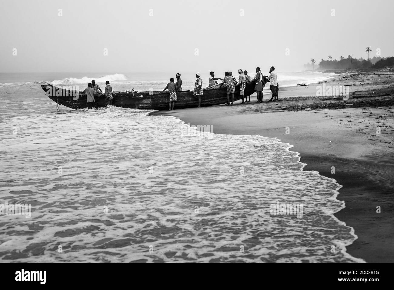 Fishermen at Kappil Beach, Varkala, Kerala, India Stock Photo - Alamy