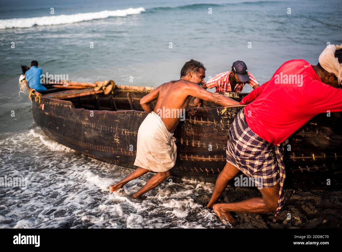 Fishermen at Kappil Beach, Varkala, Kerala, India Stock Photo - Alamy