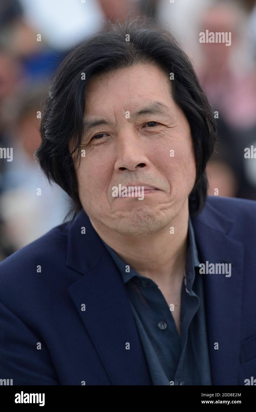 Chang-dong Lee attending the Burning Photocall held at the Palais des ...