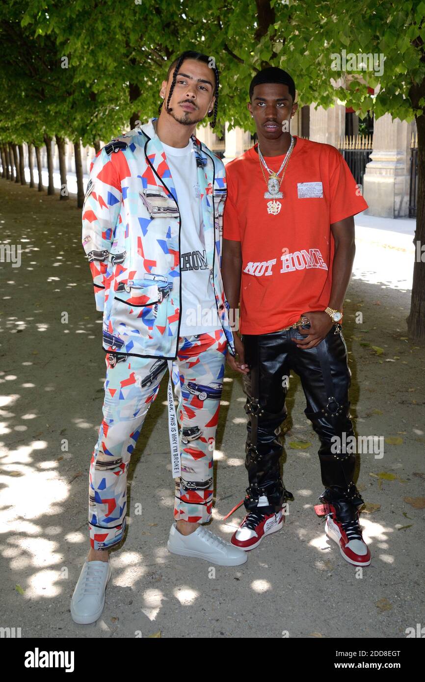 Quincy Brown (Quincy Combs) and Christian Combs attending the Louis ...