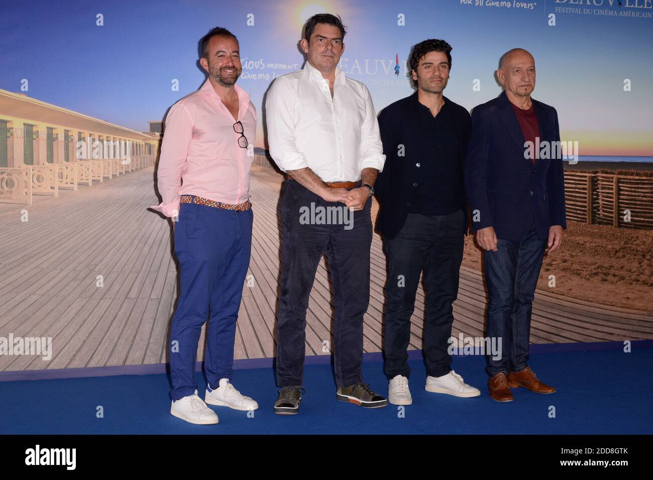 Jason Spire, Chris Weitz, Oscar Isaac, Sir Ben Kingsley attending a ...