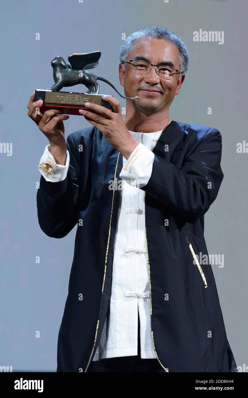 Pema Tseden receives the Orizzonti Award for Best Screenplay for 'Jinpa' attending the Closing ...