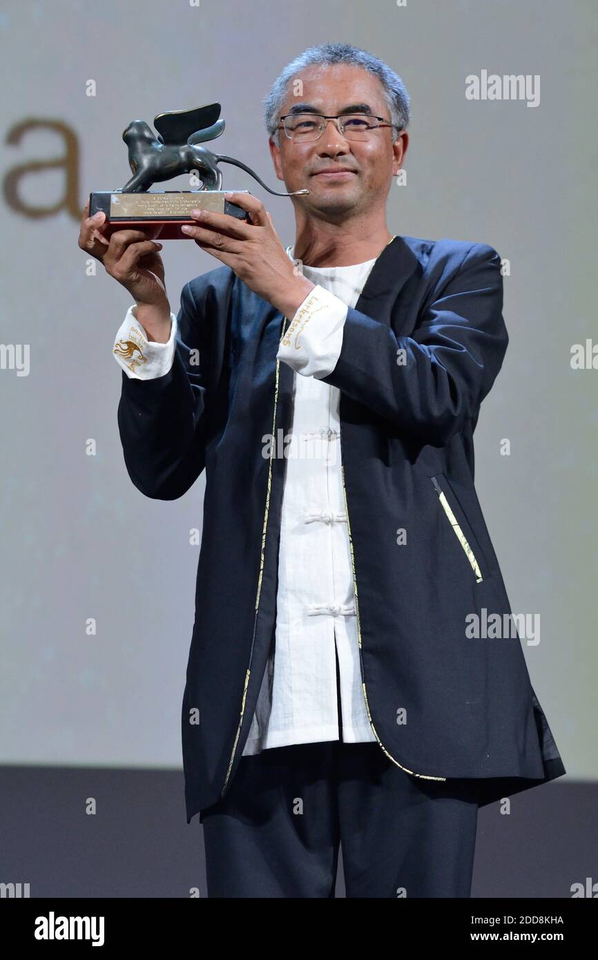 Pema Tseden receives the Orizzonti Award for Best Screenplay for 'Jinpa' attending the Closing ...