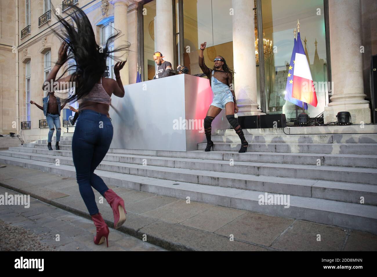 French president Emmanuel Macron and his wife Brigitte Macron open the ...