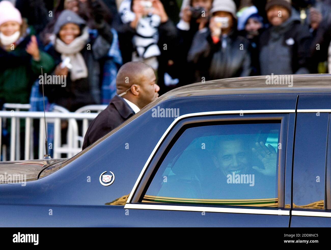 NO FILM, NO VIDEO, NO TV, NO DOCUMENTARY - President Barack Obama waves ...