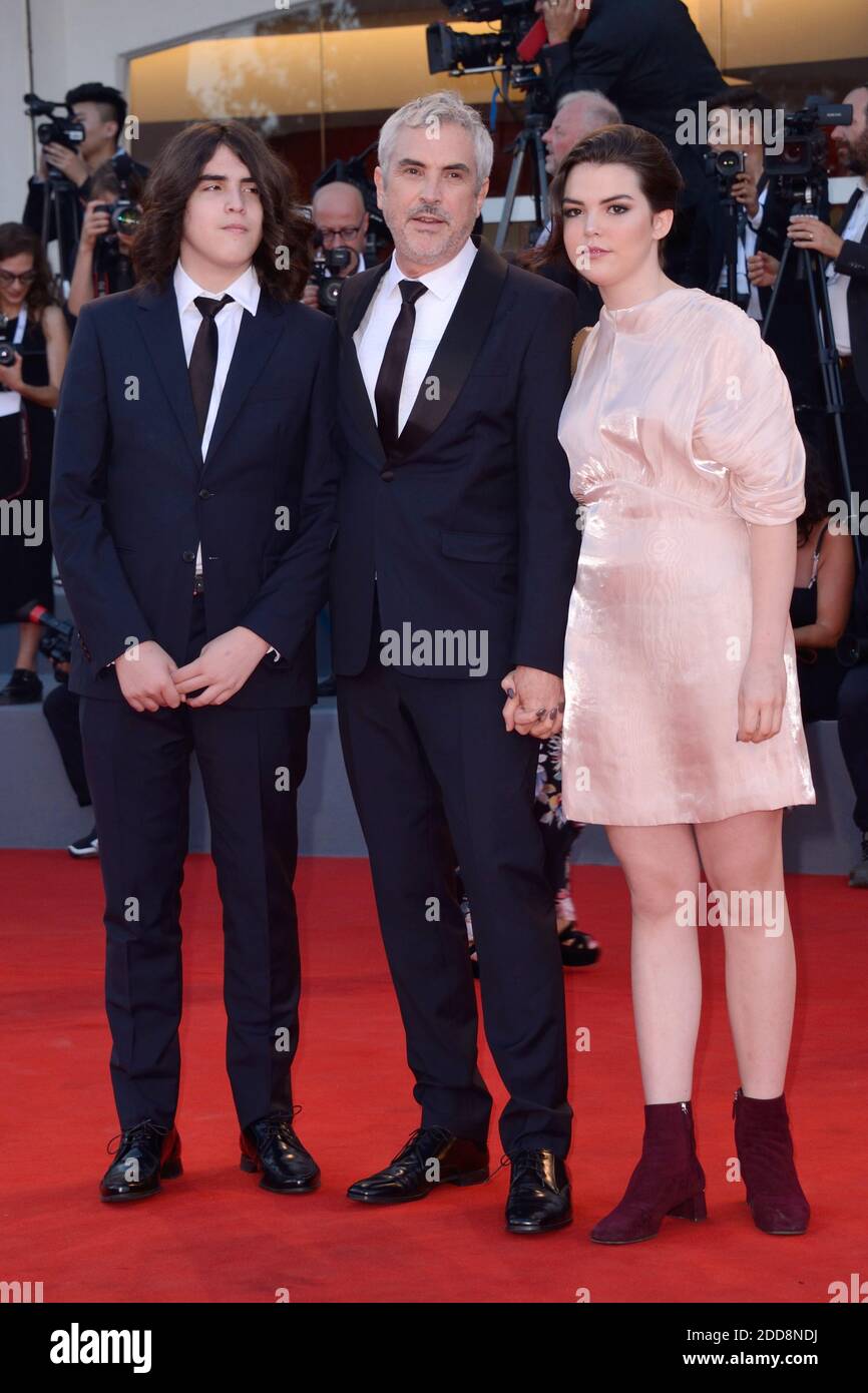 Olmo Teodoro Cuaron, Alfonso Cuaron and Tess Bu Cuaron attending the ...