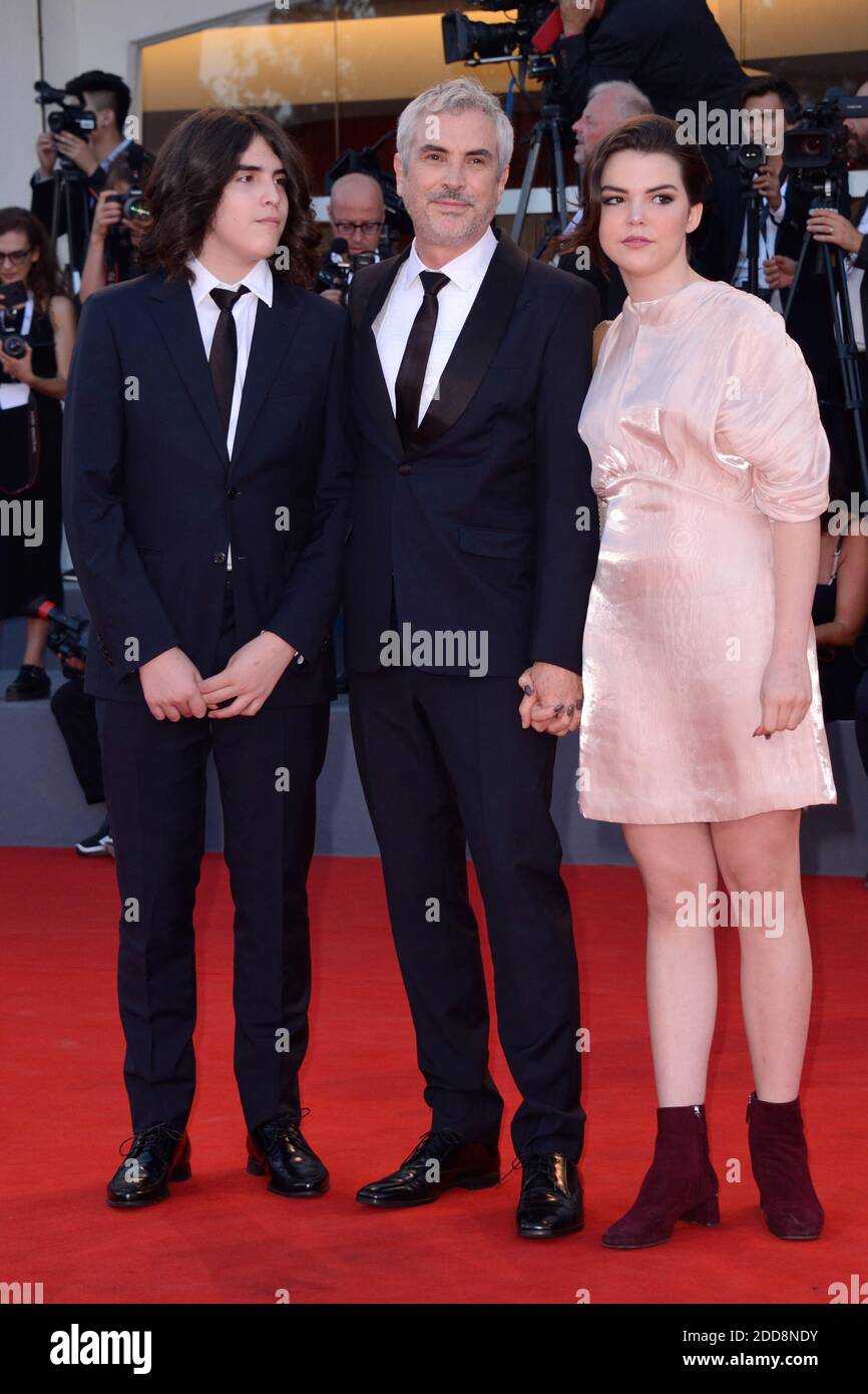 Olmo Teodoro Cuaron, Alfonso Cuaron and Tess Bu Cuaron attending the ...