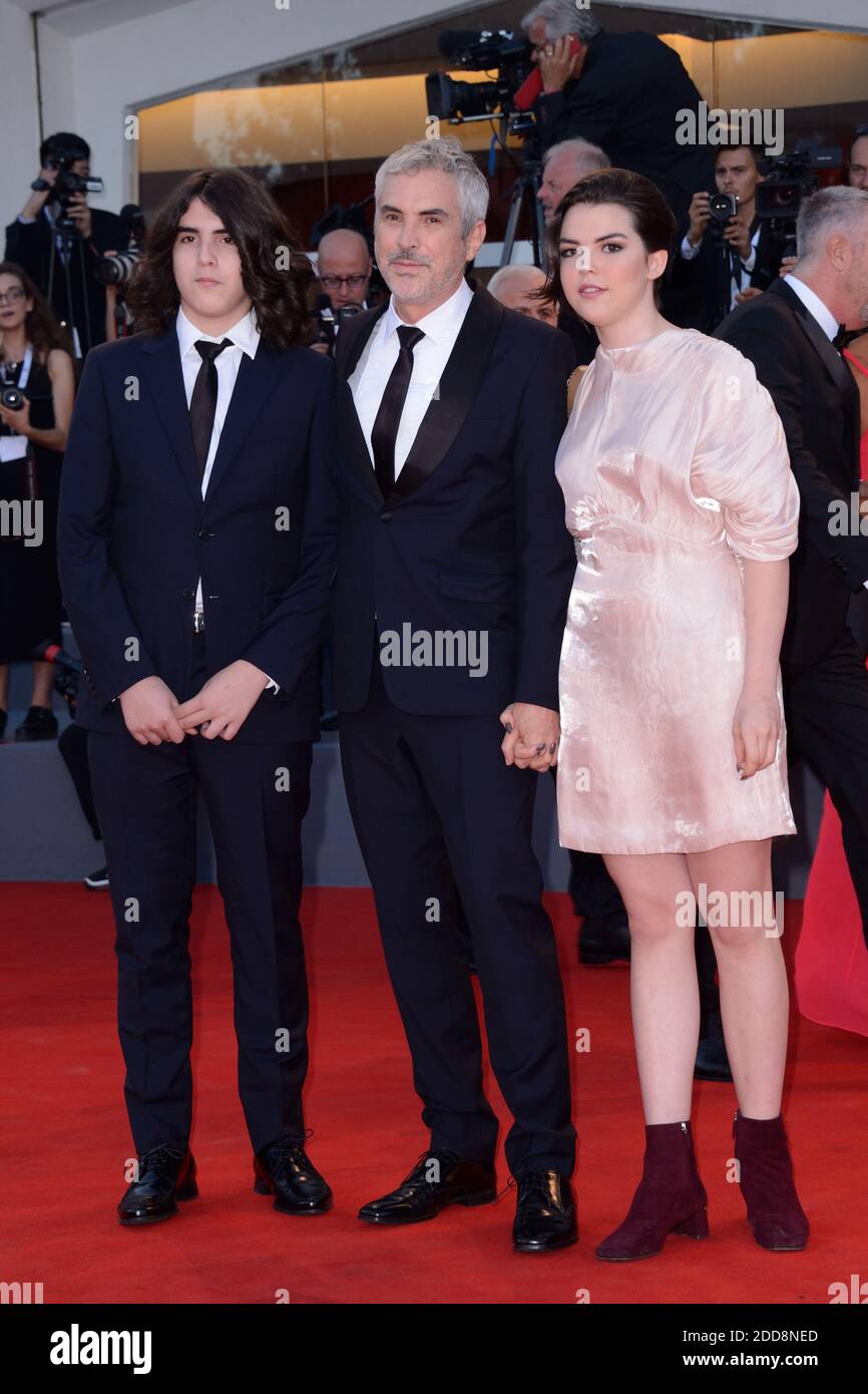 Olmo Teodoro Cuaron, Alfonso Cuaron and Tess Bu Cuaron attending the ...
