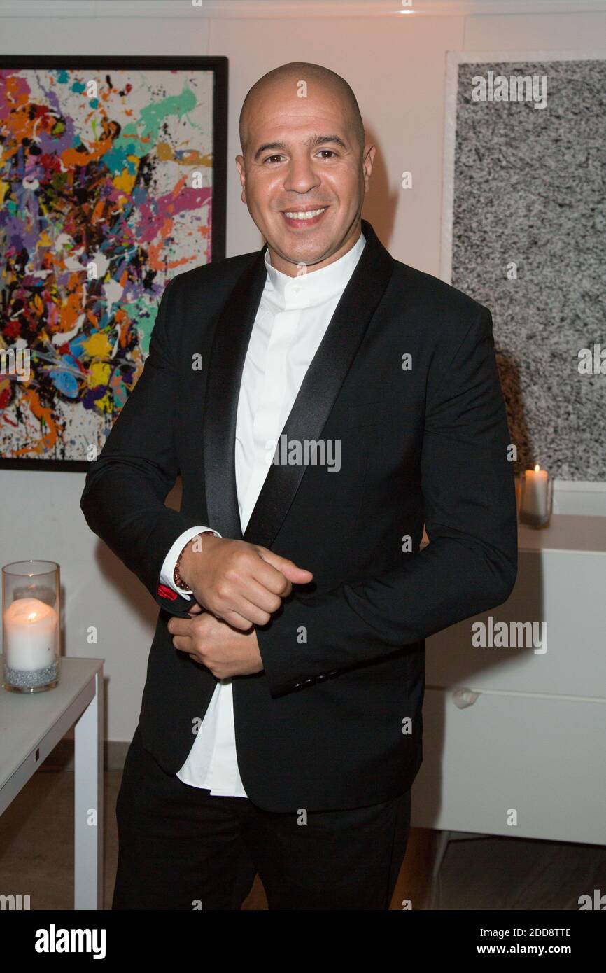 Exclusive - DJ Cut Killer at Sohso la suite party during the 71st ...