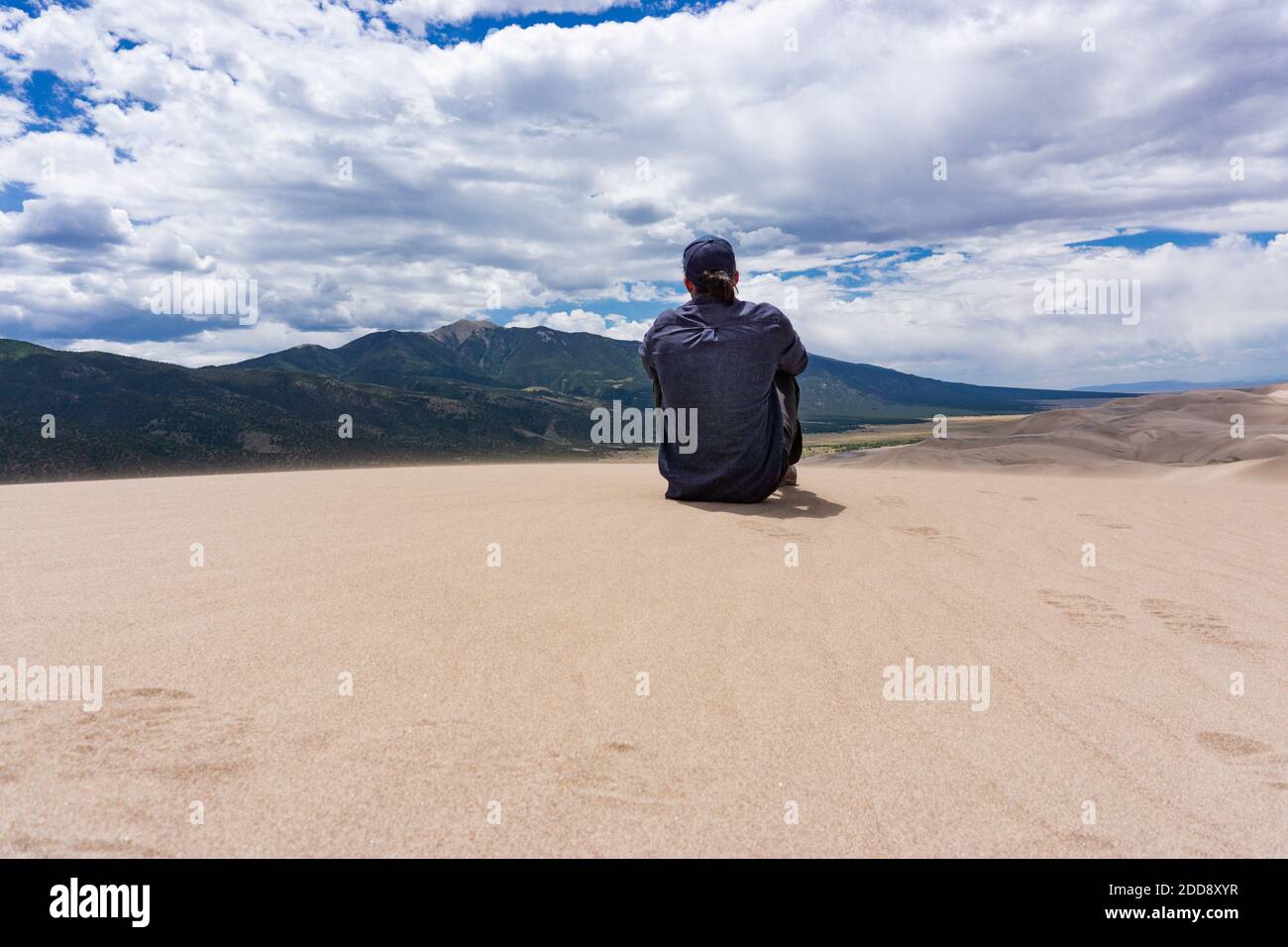 Man looks over National Sand Dunes Park Stock Photo - Alamy