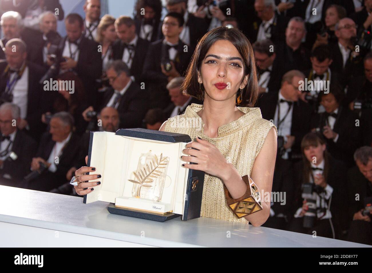 Director Alice Rohrwacher (L) poses with the Best Screenplay award for ...