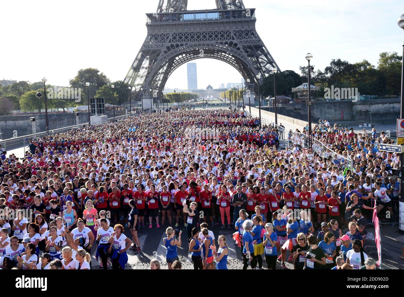 Runners take part in the 22nd La Parisienne, a 7 kilometer all women ...