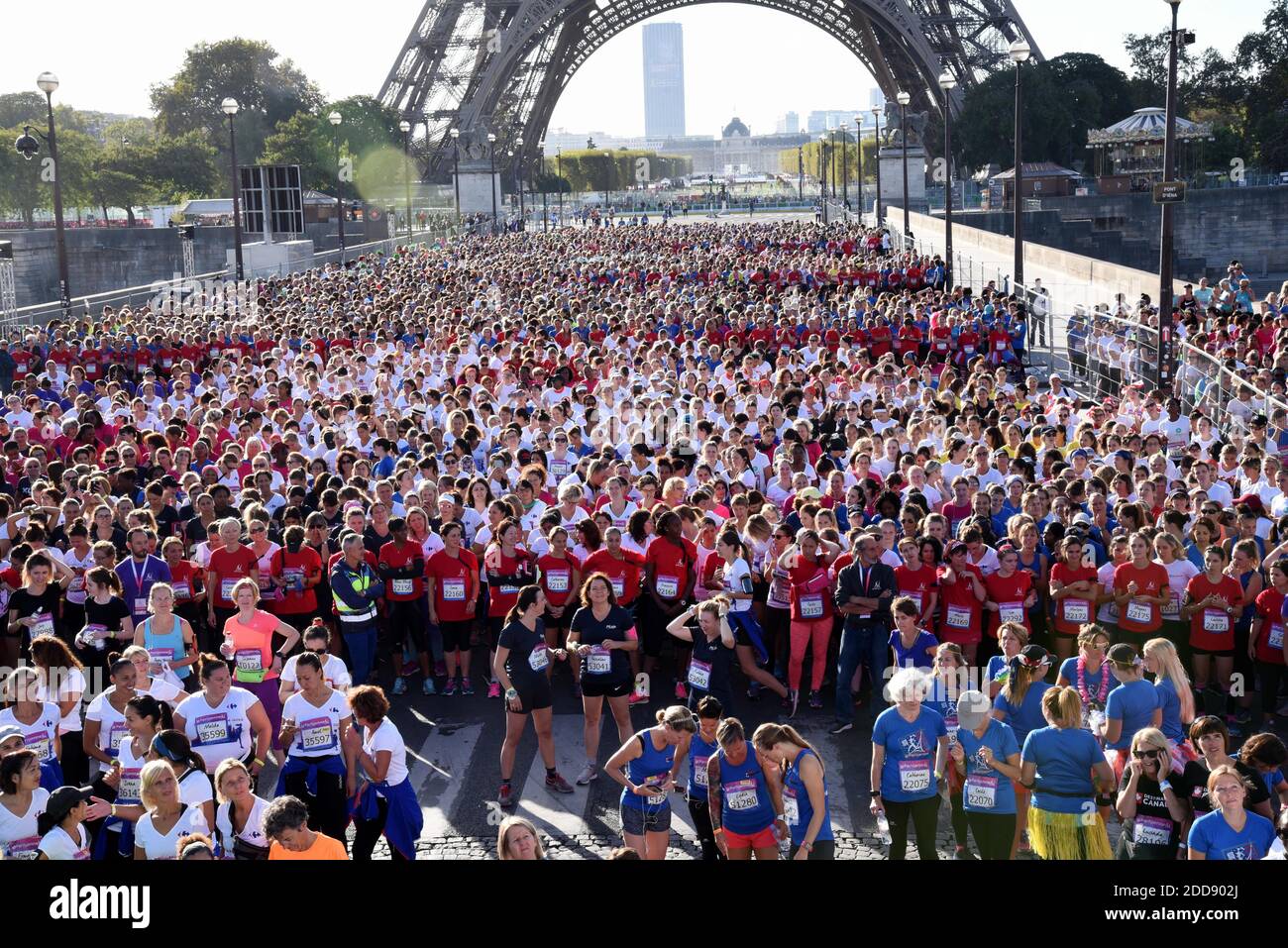 Runners take part in the 22nd La Parisienne, a 7 kilometer all women ...