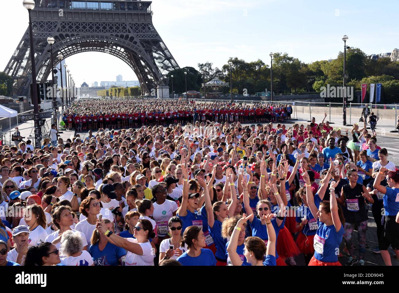Runners take part in the 22nd La Parisienne, a 7 kilometer all women ...