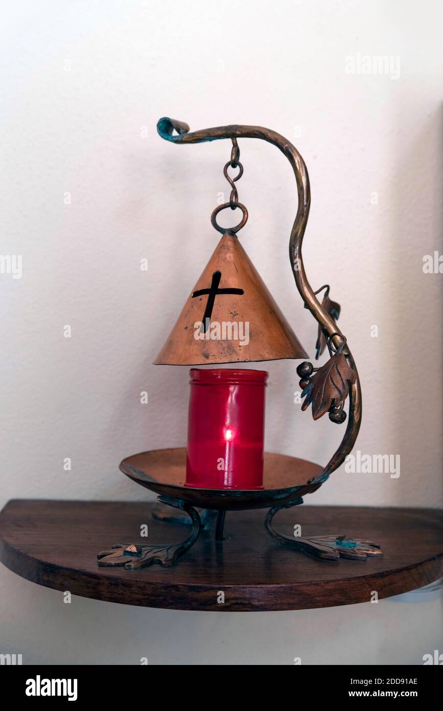 Red lamp in a Catholic church with a cross Stock Photo - Alamy