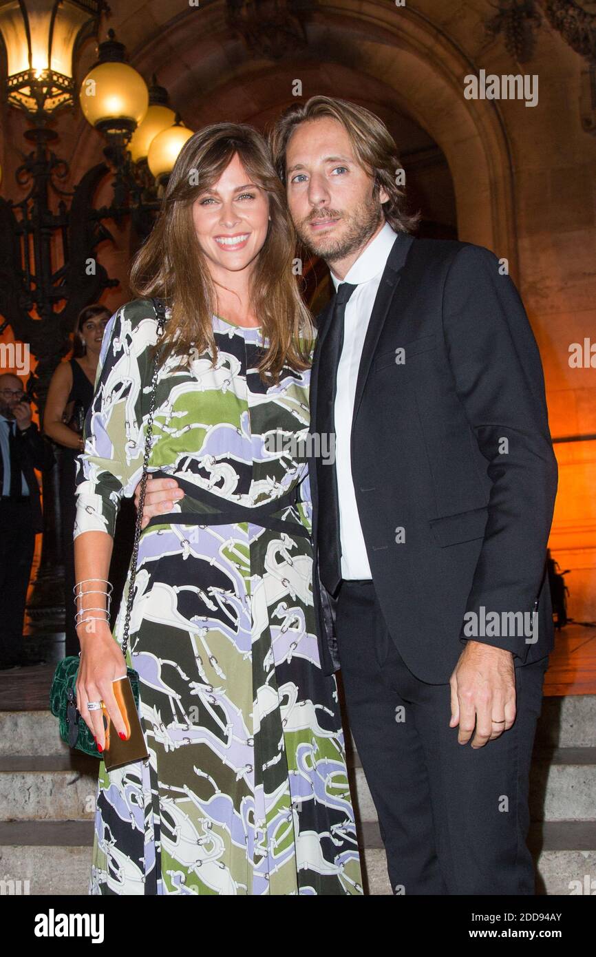 Ophelie Meunier and Mathieu Vergne arriving at Longchamp 70th ...