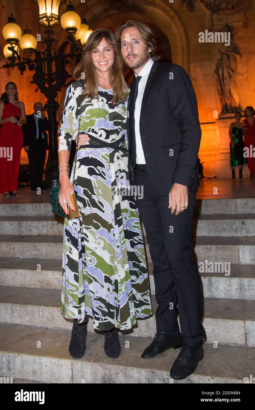 Ophelie Meunier and Mathieu Vergne arriving at Longchamp 70th ...