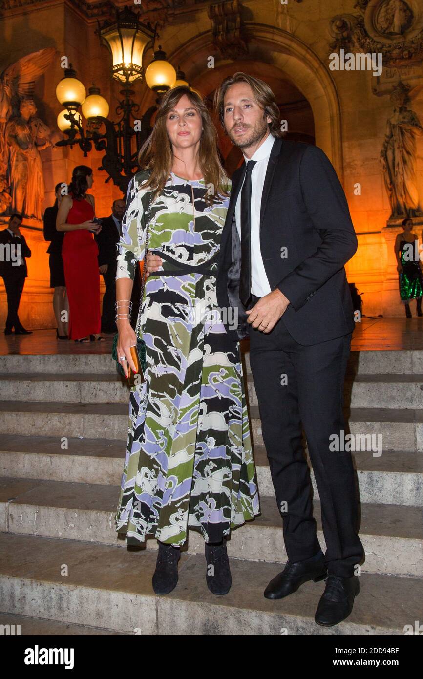 Ophelie Meunier and Mathieu Vergne arriving at Longchamp 70th ...
