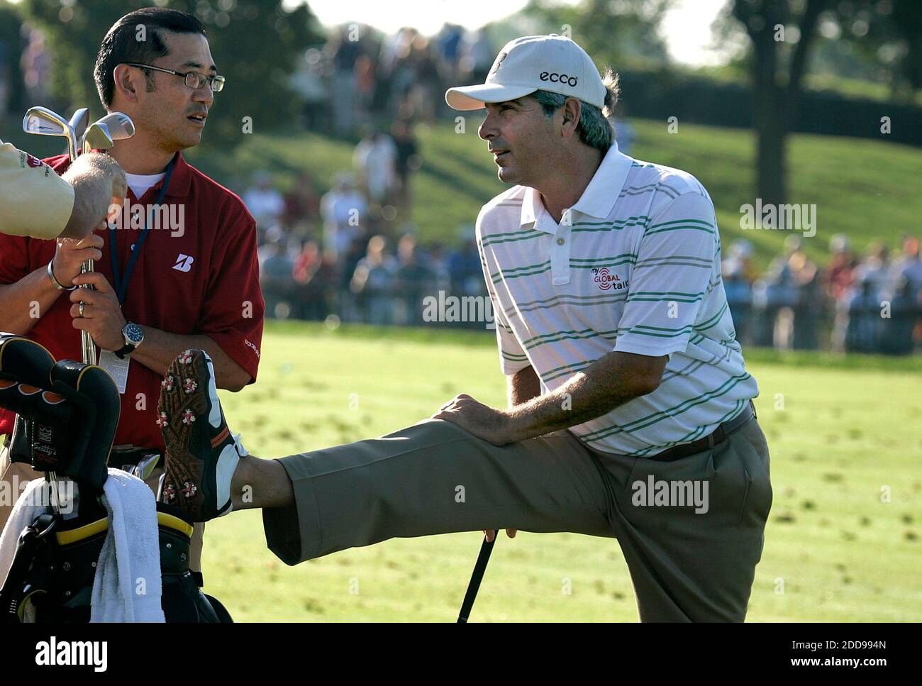 NO FILM, NO VIDEO, NO TV, NO DOCUMENTARY - USA's Fred Couples stretches ...